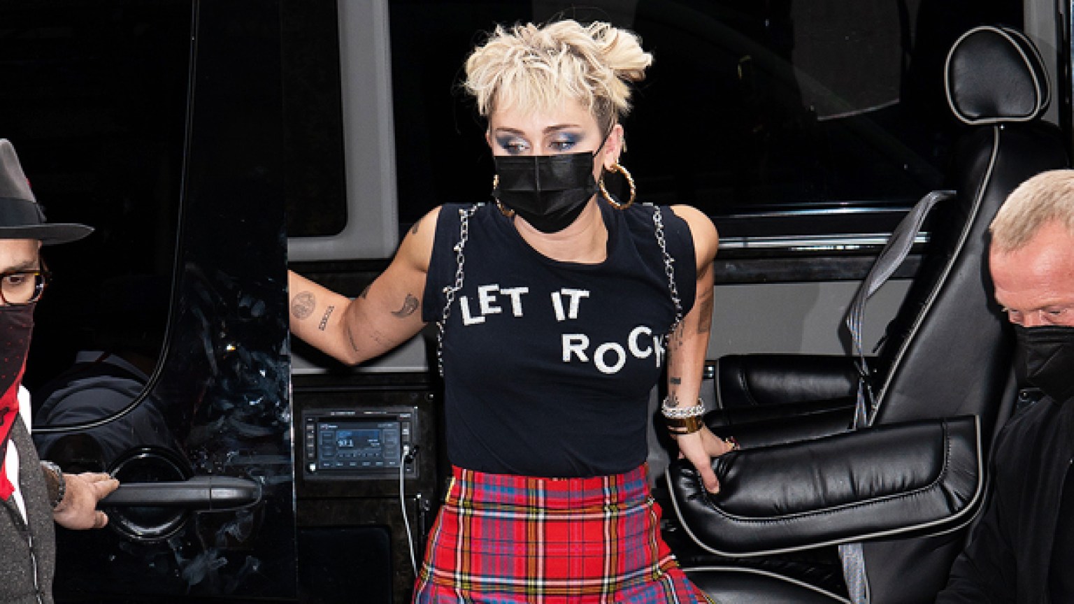 Miley Cyrus Rocks A Tartan Mini Skirt, Fishnets, & Garter At Rehearsal ...
