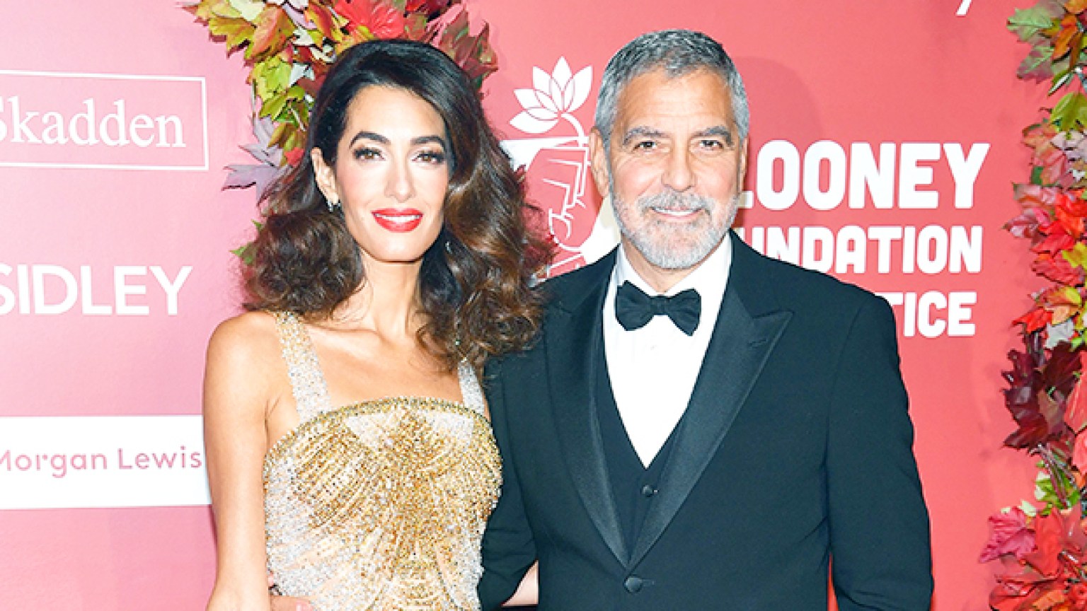 George & Amal Clooney Cuddle On Red Carpet At Clooney Foundation Gala ...
